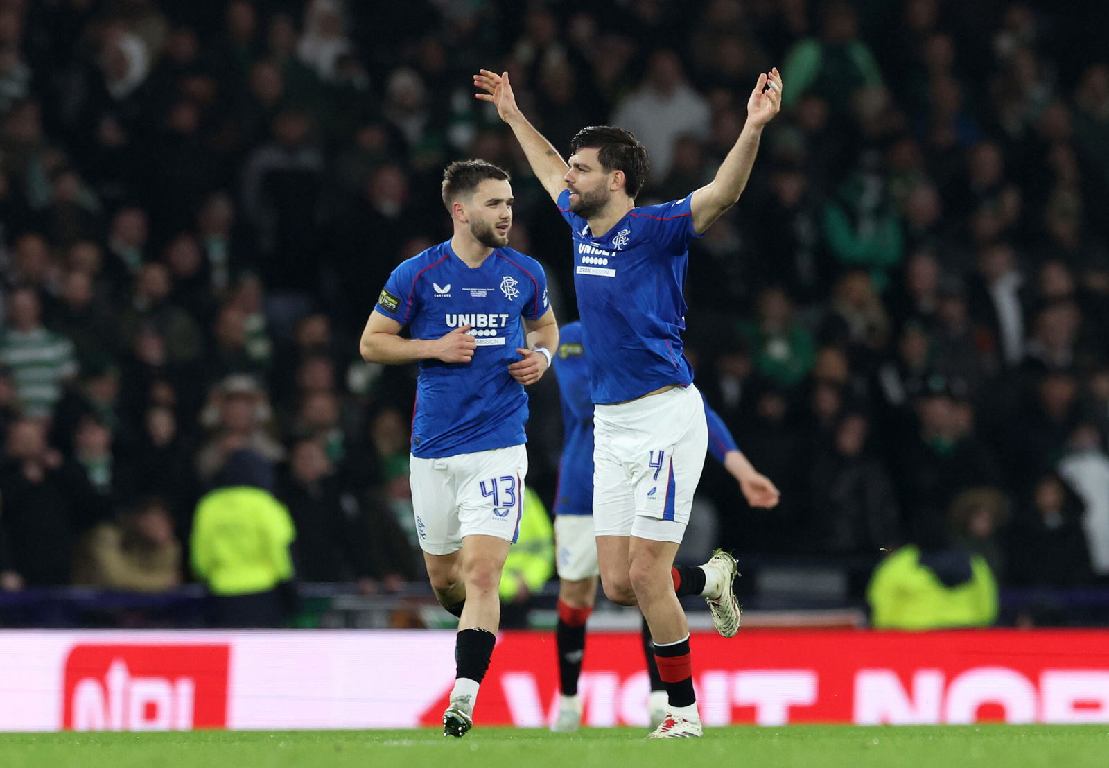 Joy for Robin Propper as he lifts the Closing The Gap Trophy at Hampden ...